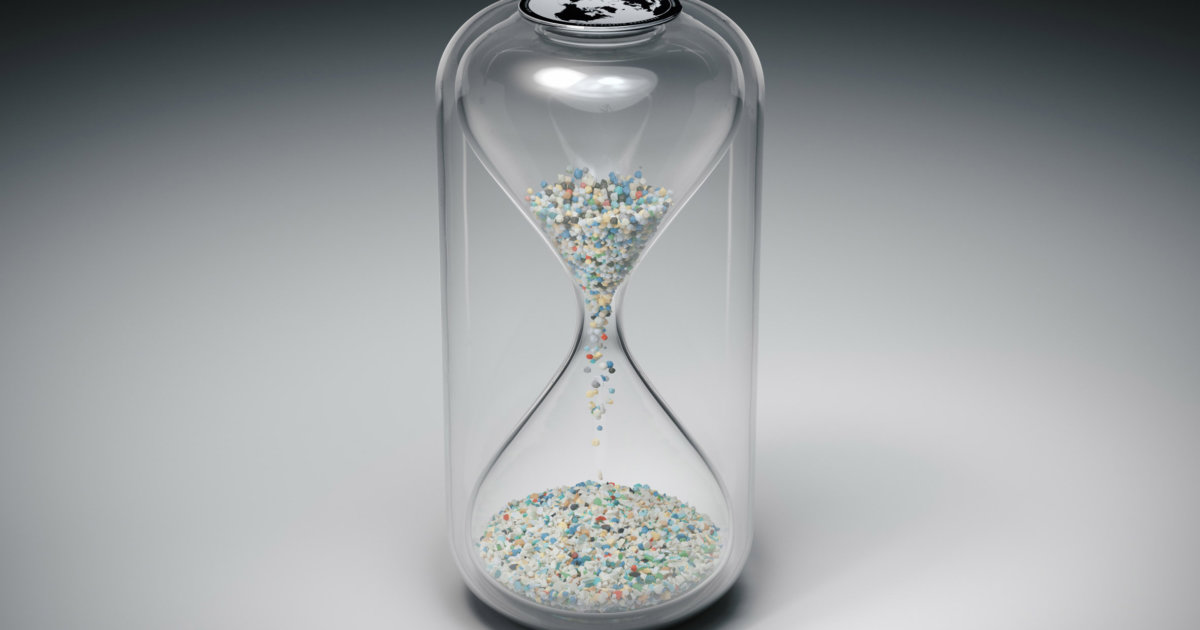 Hourglass filled with ocean microplastics.